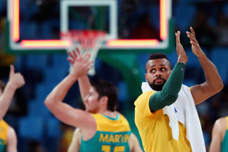 How is Team Australia staying competitive in Olympic basketball?