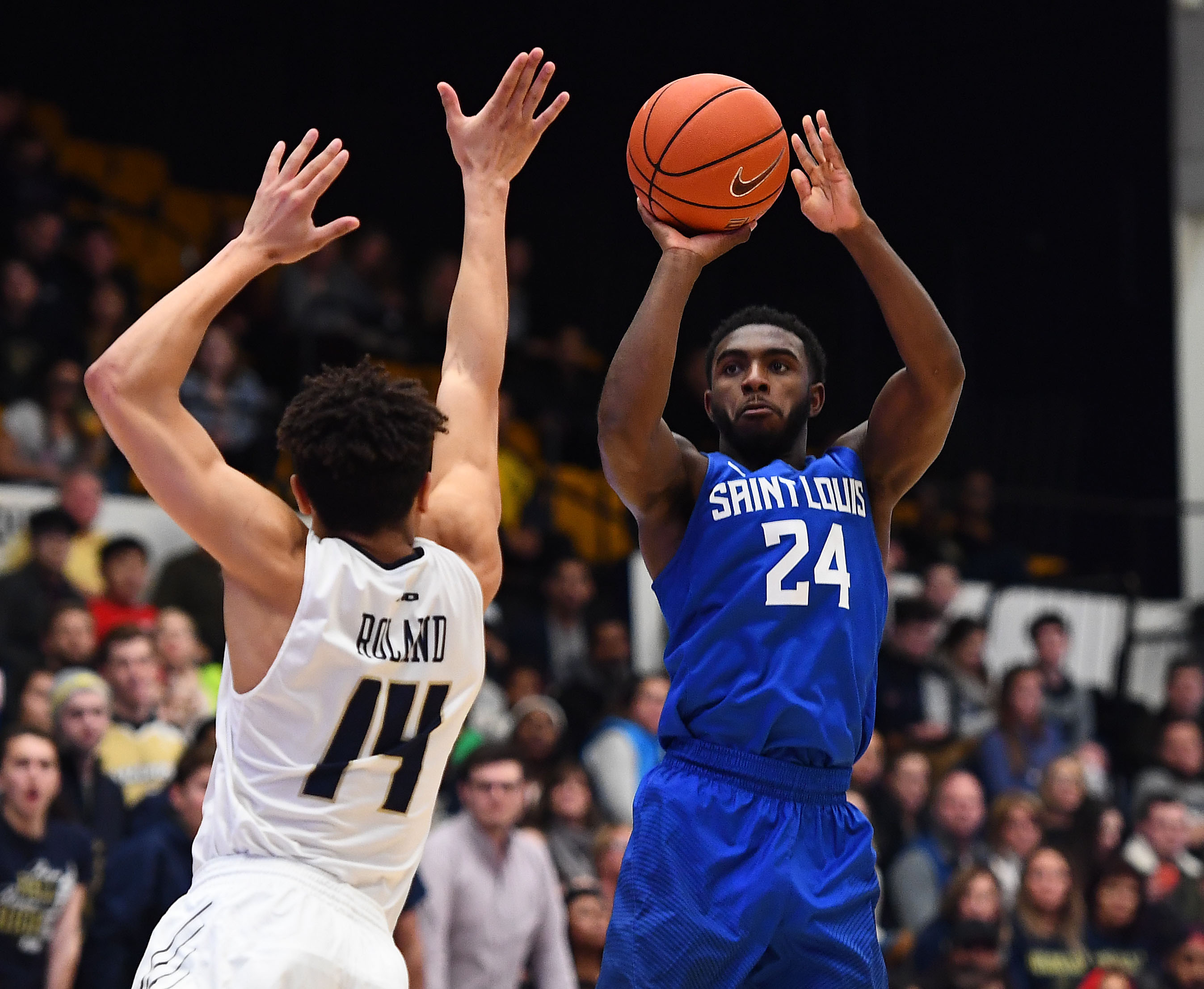 Saint Louis Billikens award final scholarship to Aaron Hines